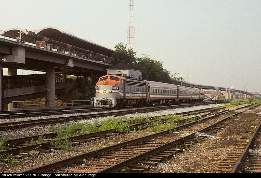 MDOT FP7A 7183 heads WB past QN Tower